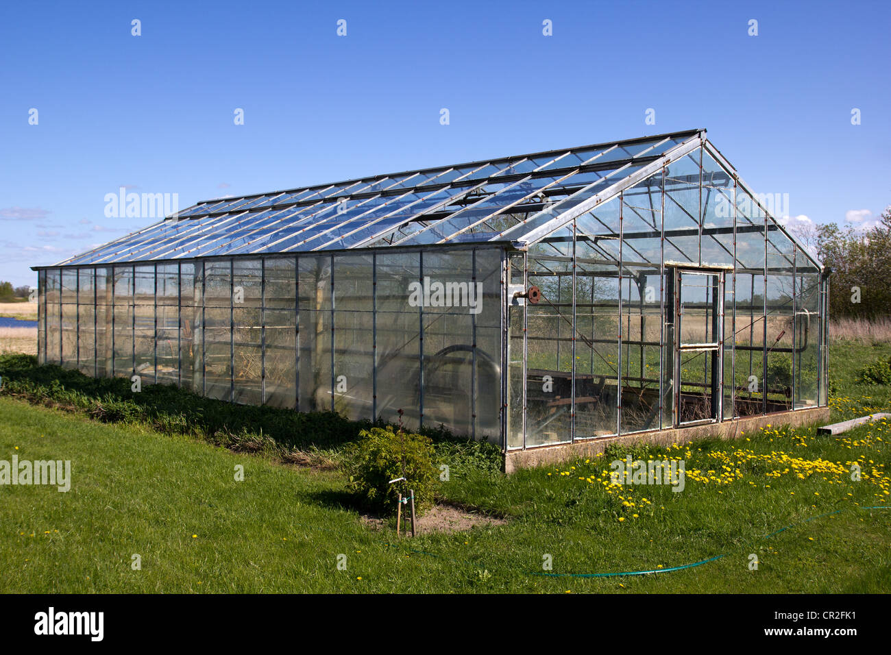 Old greenhouse in bad condition; need repair Stock Photo - Alamy