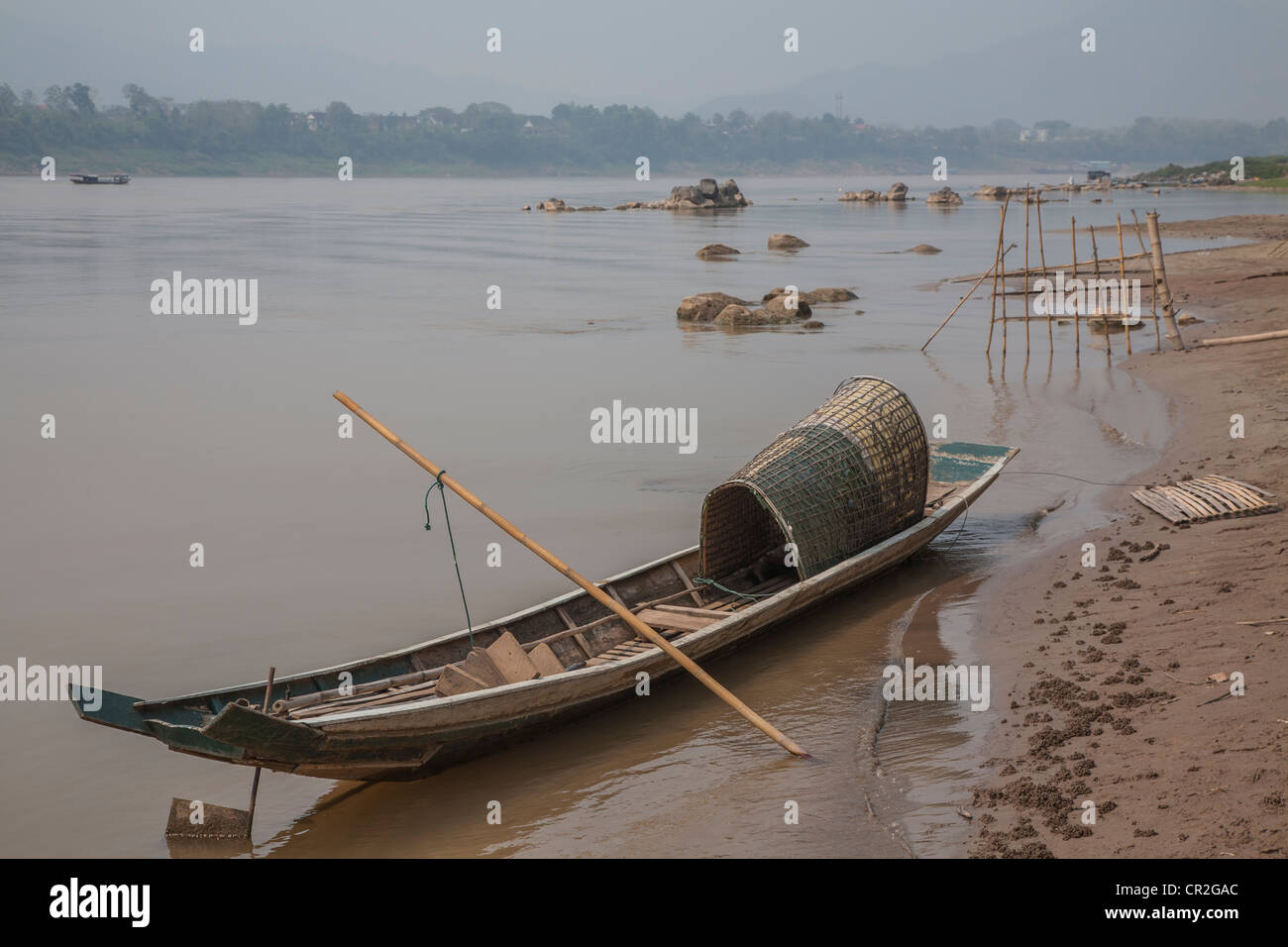 Longtail boat on the Mekong in Laos Stock Photo - Alamy