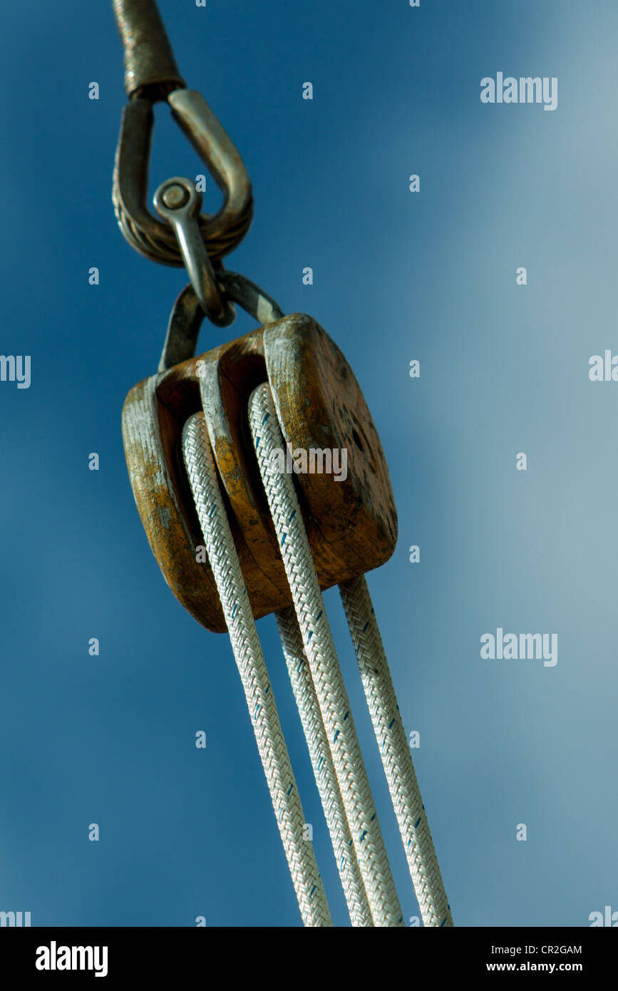 wooden pulley on boat, rope of sail on a boat Stock Photo - Alamy