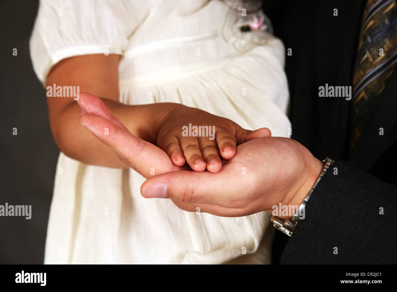 Adult baby hand connection hi-res stock photography and images - Alamy