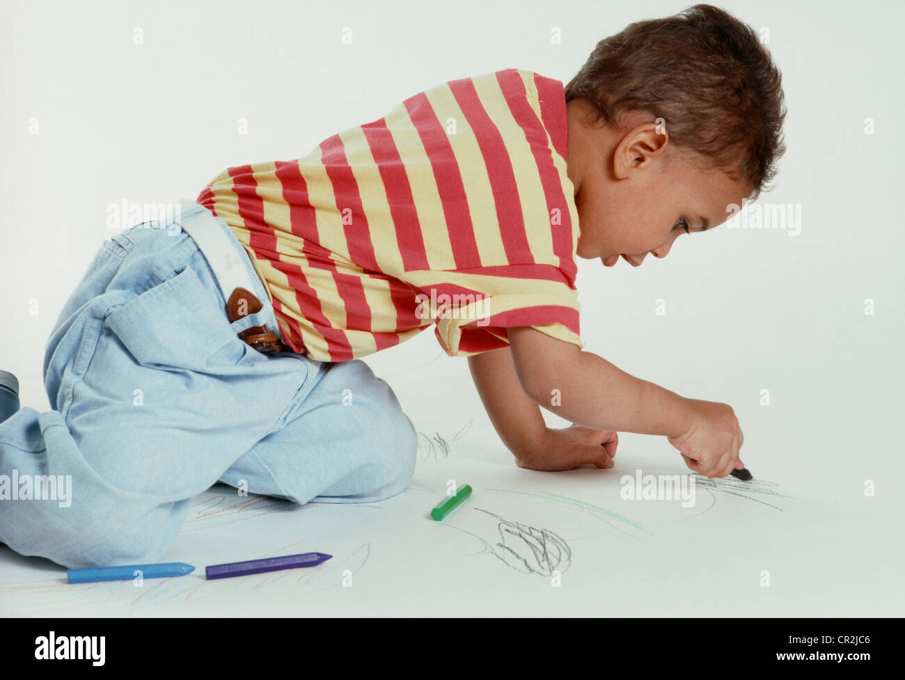 Boy coloring crayons drawing hi-res stock photography and images - Alamy