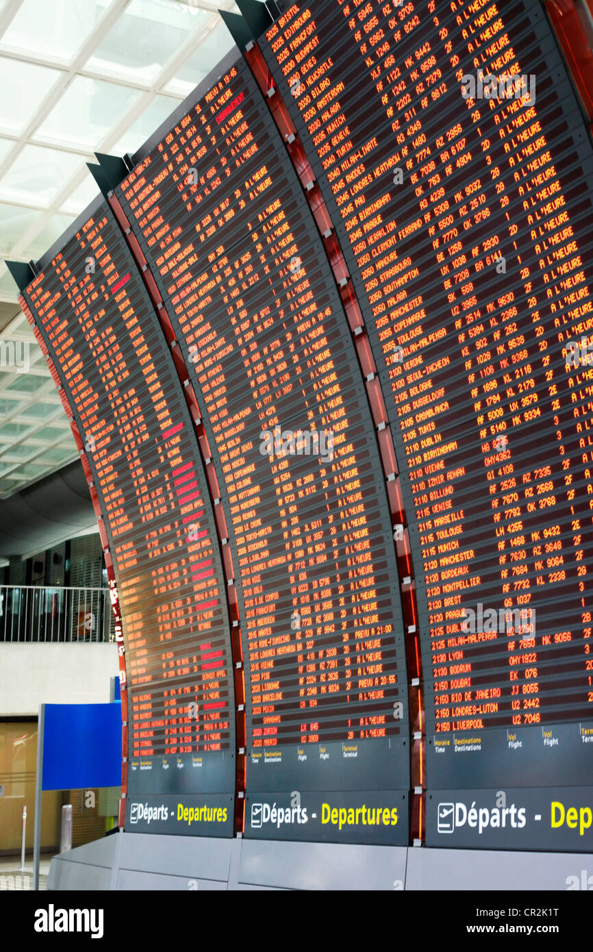 Flight announcement shows time of departure on a screen Stock Photo - Alamy