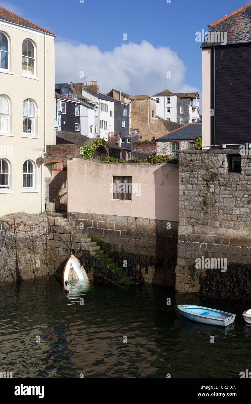 Rowing Boat tied by concrete steps in Falmouth Stock Photo - Alamy