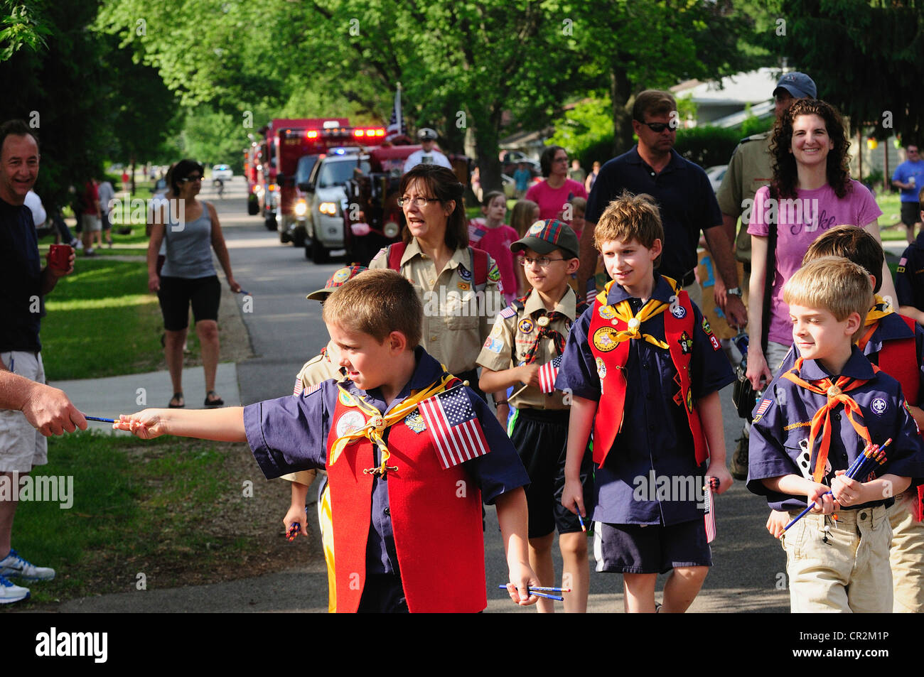 Boy Scout troop handing out pencils during Memorial Day Parade Stock ...