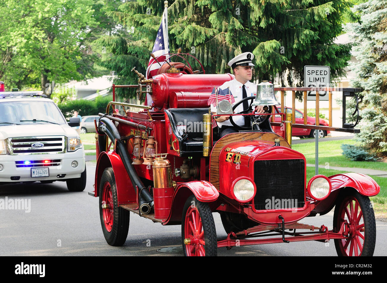 A vintage 1923 fire engine from small town America riding in the ...