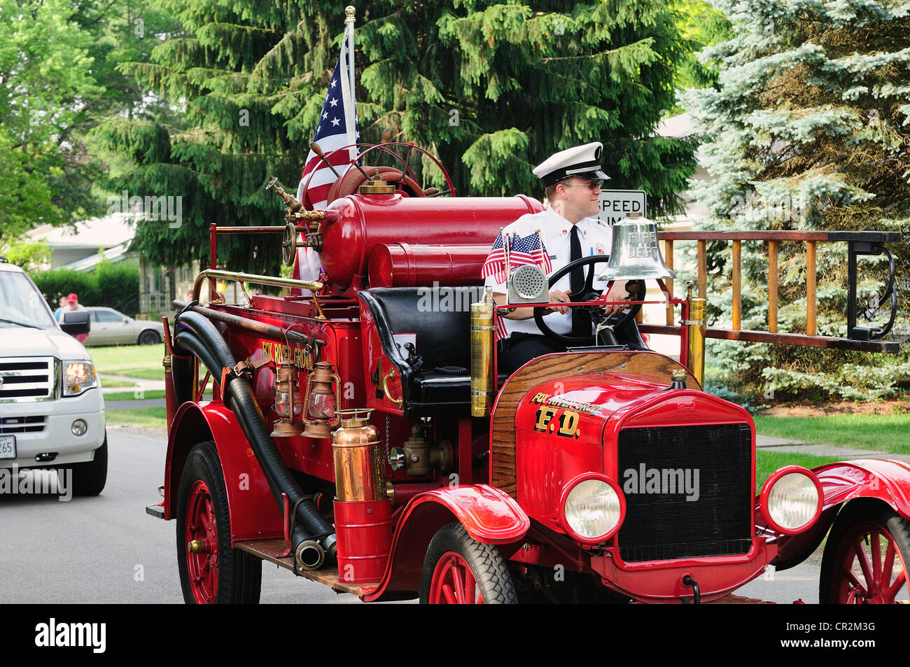 A vintage 1923 fire engine from small town America riding in the ...