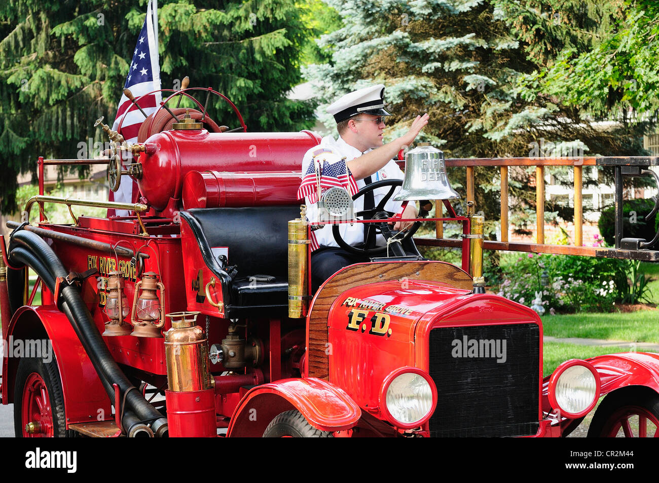 A vintage 1923 fire engine from small town America riding in the ...