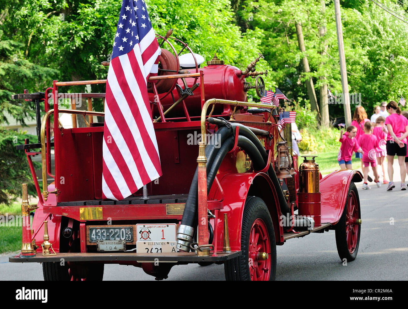 A vintage 1923 fire engine from small town America riding in the ...