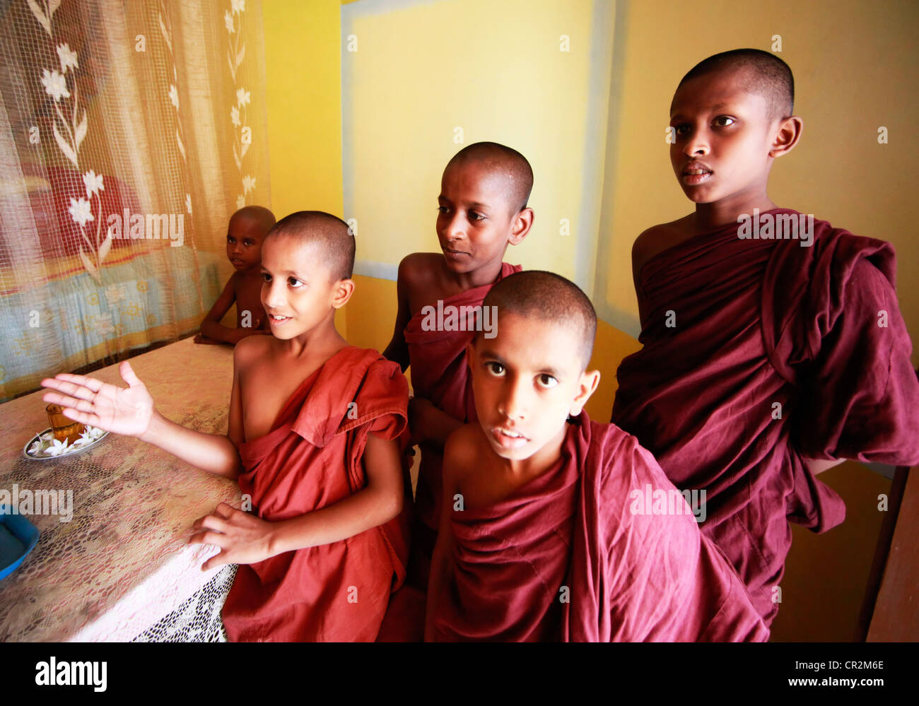 Children - Buddhists in a temple Stock Photo - Alamy