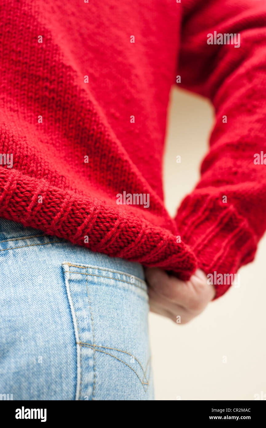 Putting on a jumper hi-res stock photography and images - Alamy