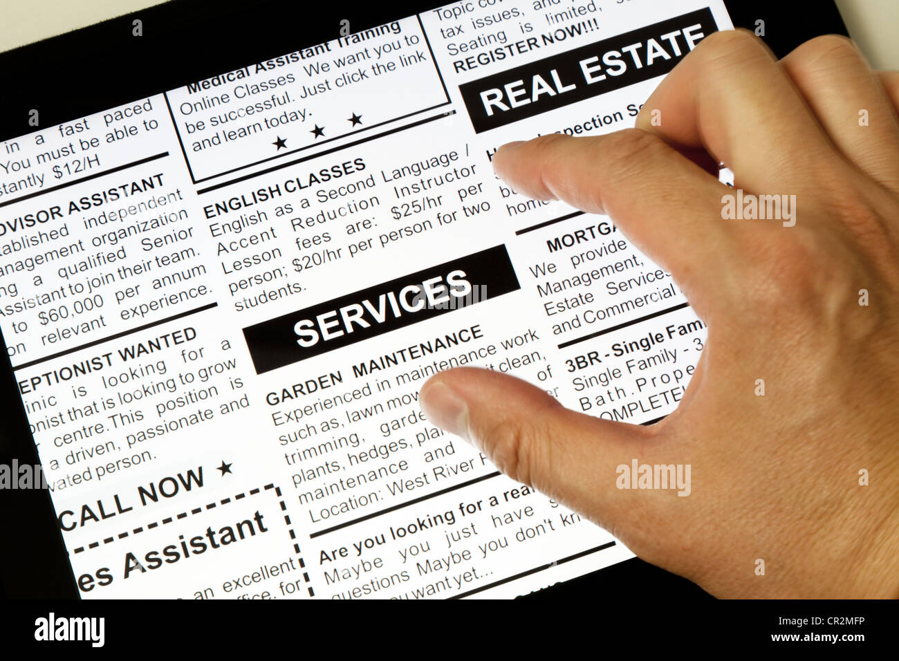 Fake Classified Ad, newspaper and Touch Screen, business concept Stock ...