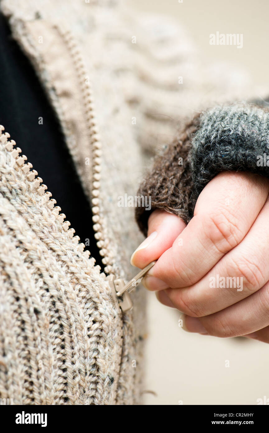 Putting on a jumper hi-res stock photography and images - Alamy