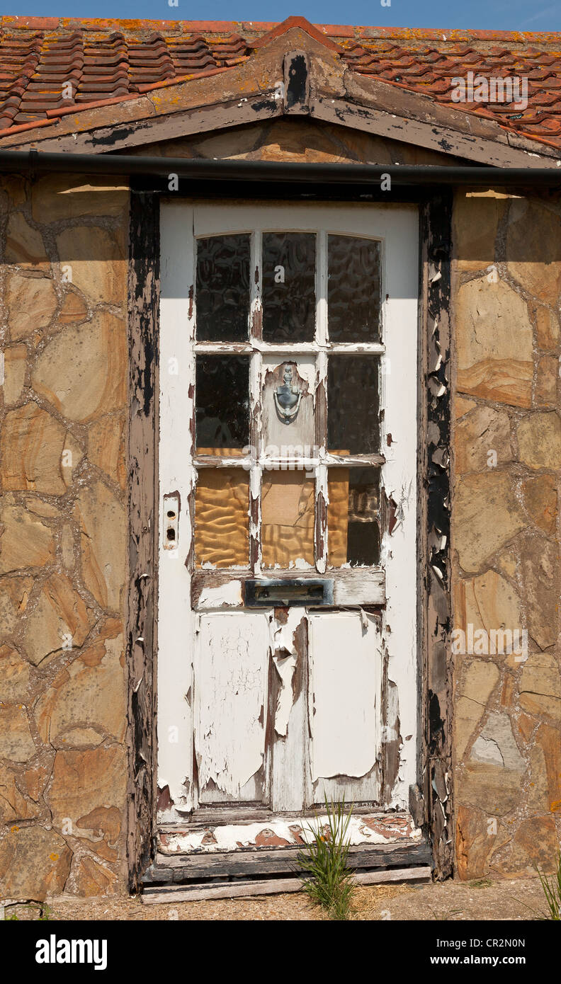 Rotting wooden front door of abandoned cottage Stock Photo - Alamy