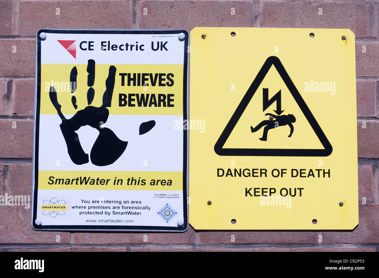 Sign warning against Electrocution Stock Photo - Alamy