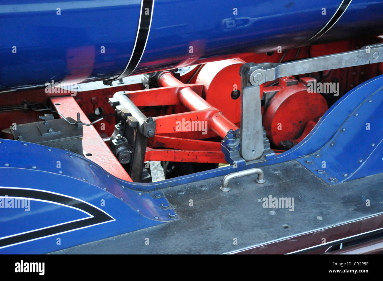 Caledonian 828's red pistons under blue boiler Stock Photo - Alamy