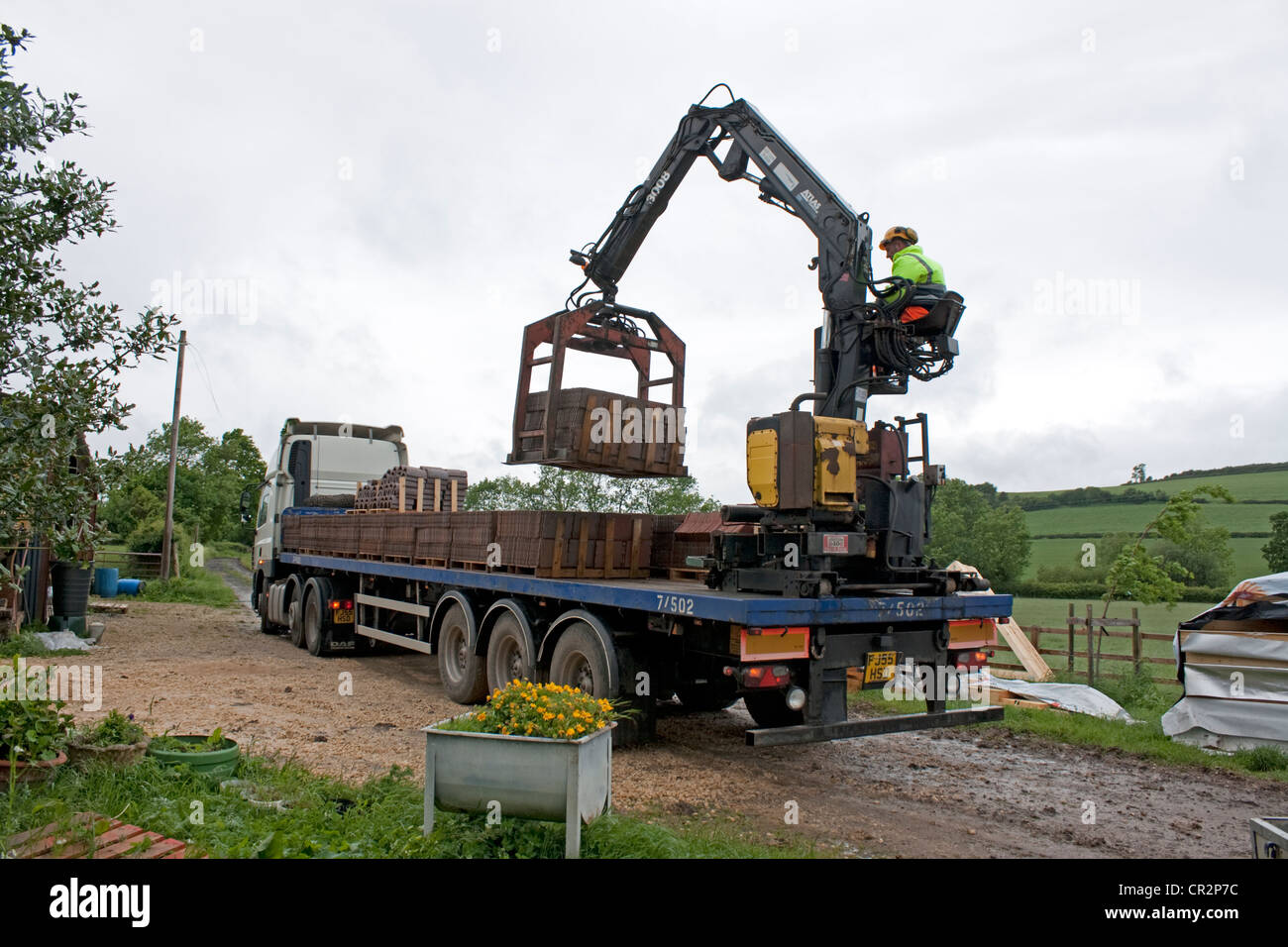Unload lorry hi-res stock photography and images - Alamy
