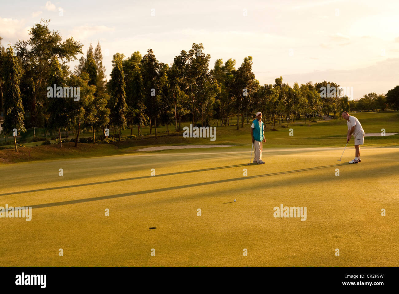 Man playing golf at Mactan Coral Golf Club. Lapu-Lapu City, Metro Cebu ...