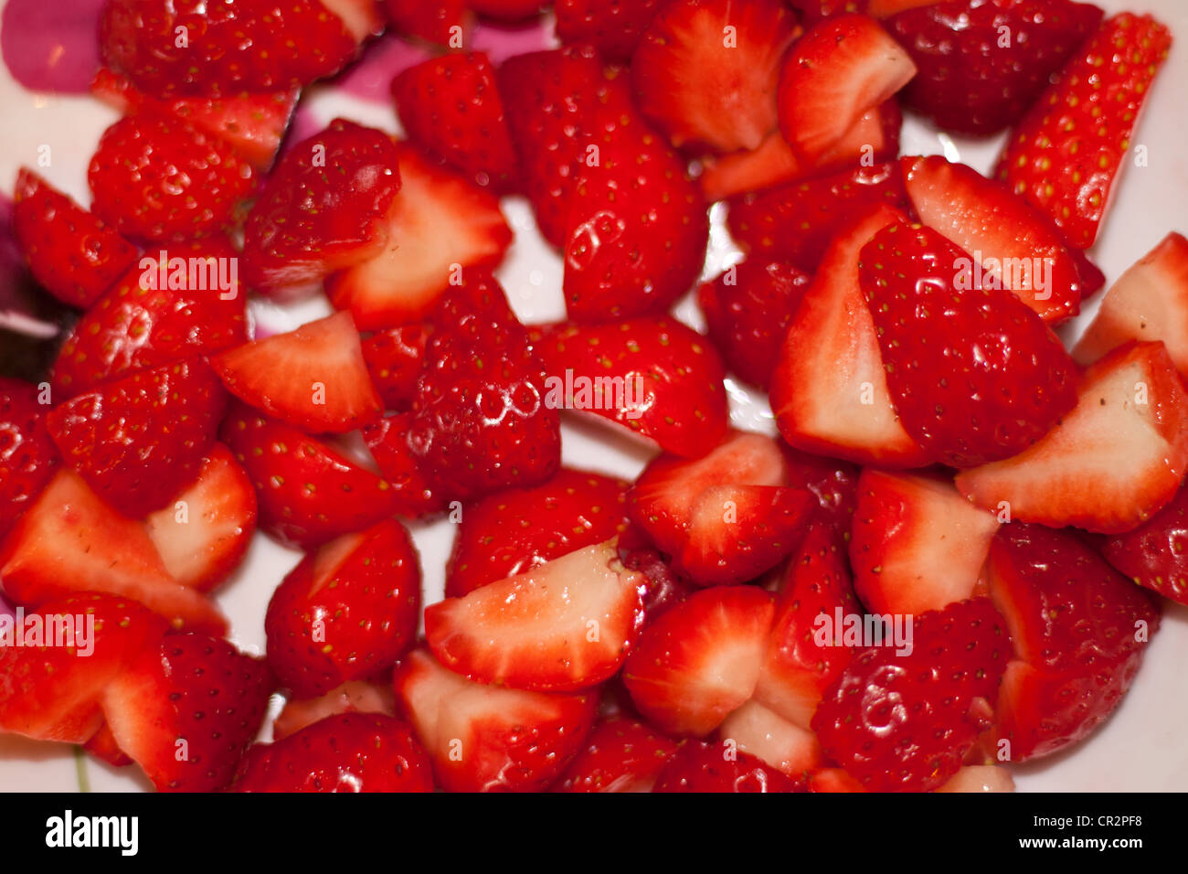 Assorted chopped strawberries Stock Photo - Alamy