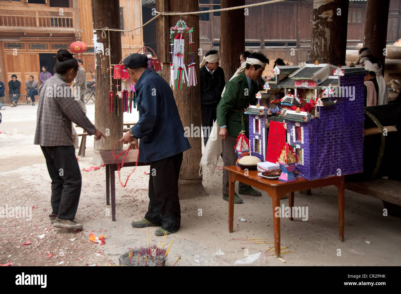 Dong people making offerings at a funeral rite, Zhaoxing Dong Village ...