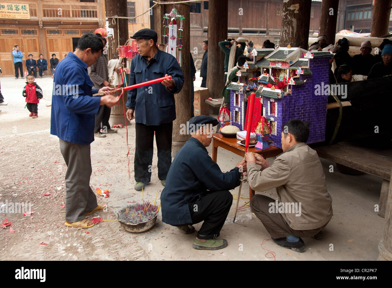 Dong people making offerings at a funeral rite, Zhaoxing Dong Village ...