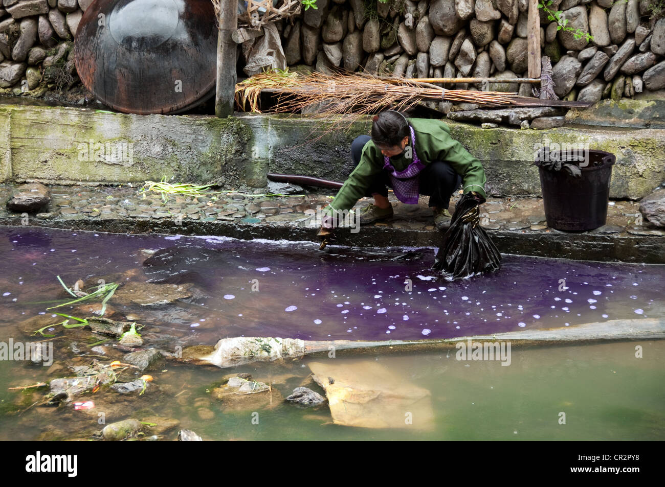 Washing clothes in stream hi-res stock photography and images - Alamy