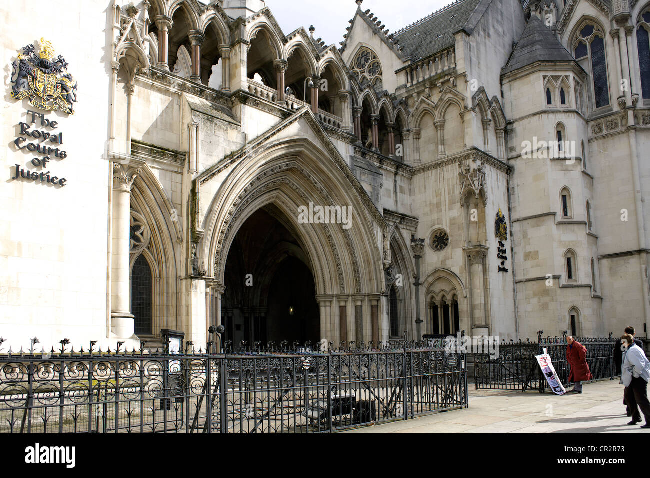 Former News of the World photographer Ian Cutler demonstrates during ...