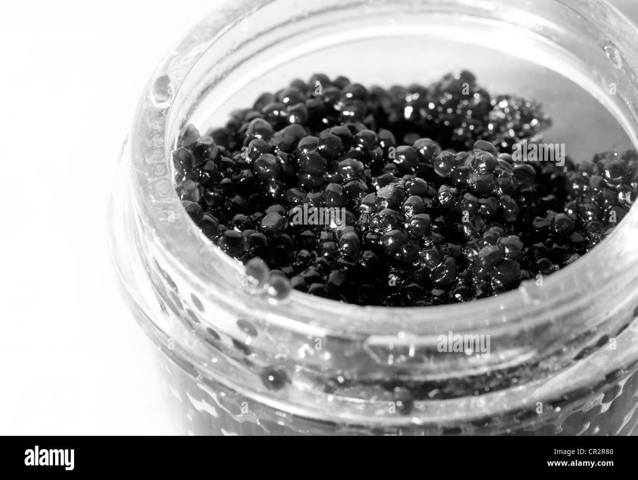 Black caviar in glass bank close-up Stock Photo - Alamy