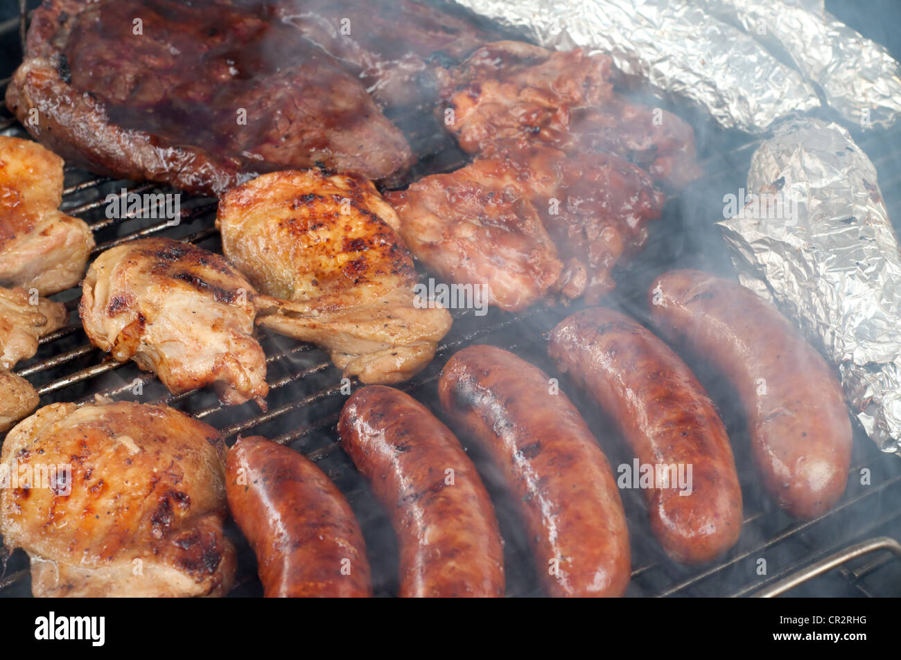 Meat on barbecue grill Stock Photo - Alamy