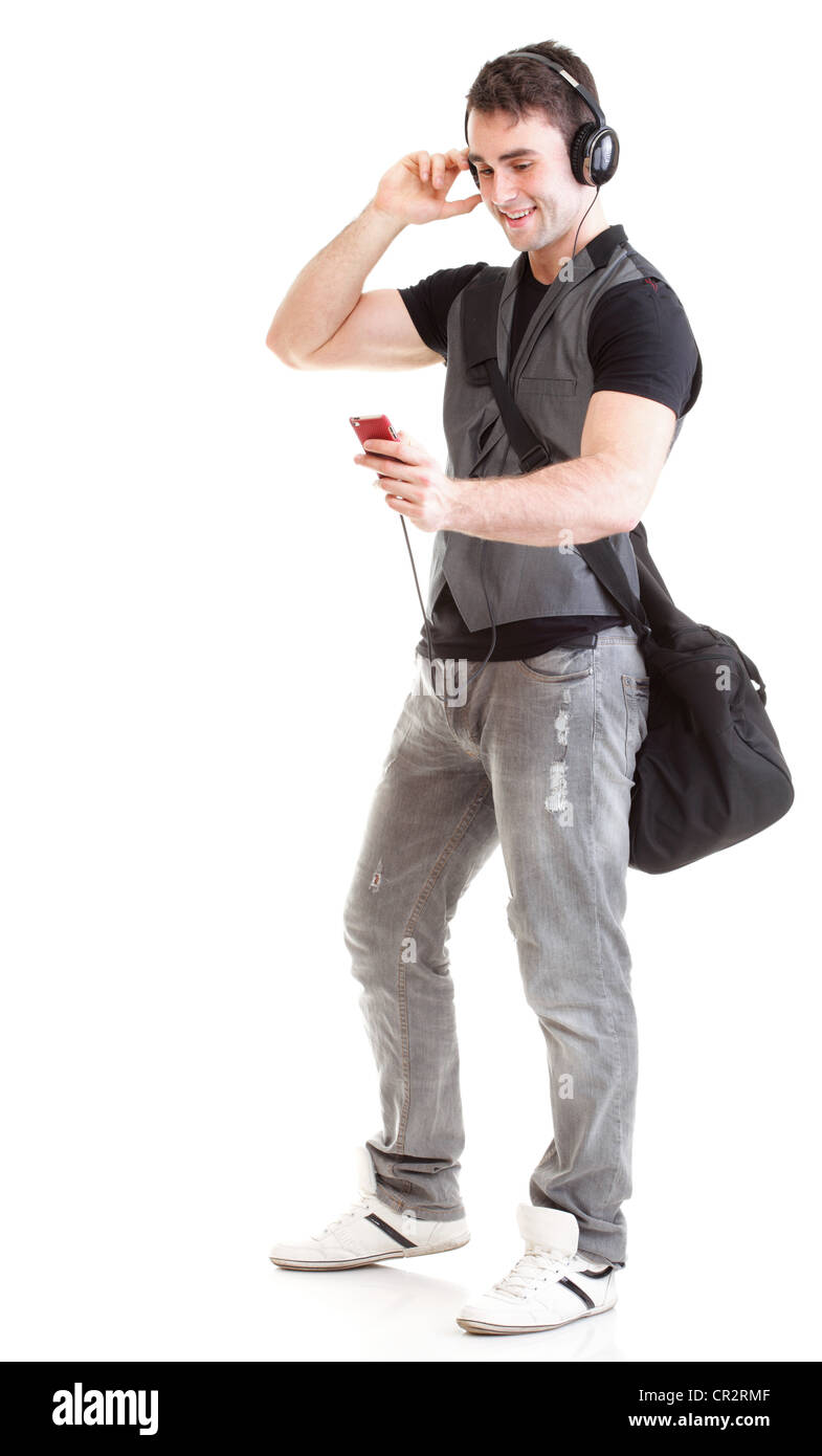 Full length portrait school boy with phone isolated on white. Music or ...