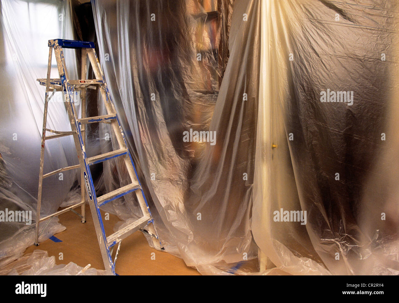 Residential interior. Apartment interiors. Room wrapped in plastic drop ...