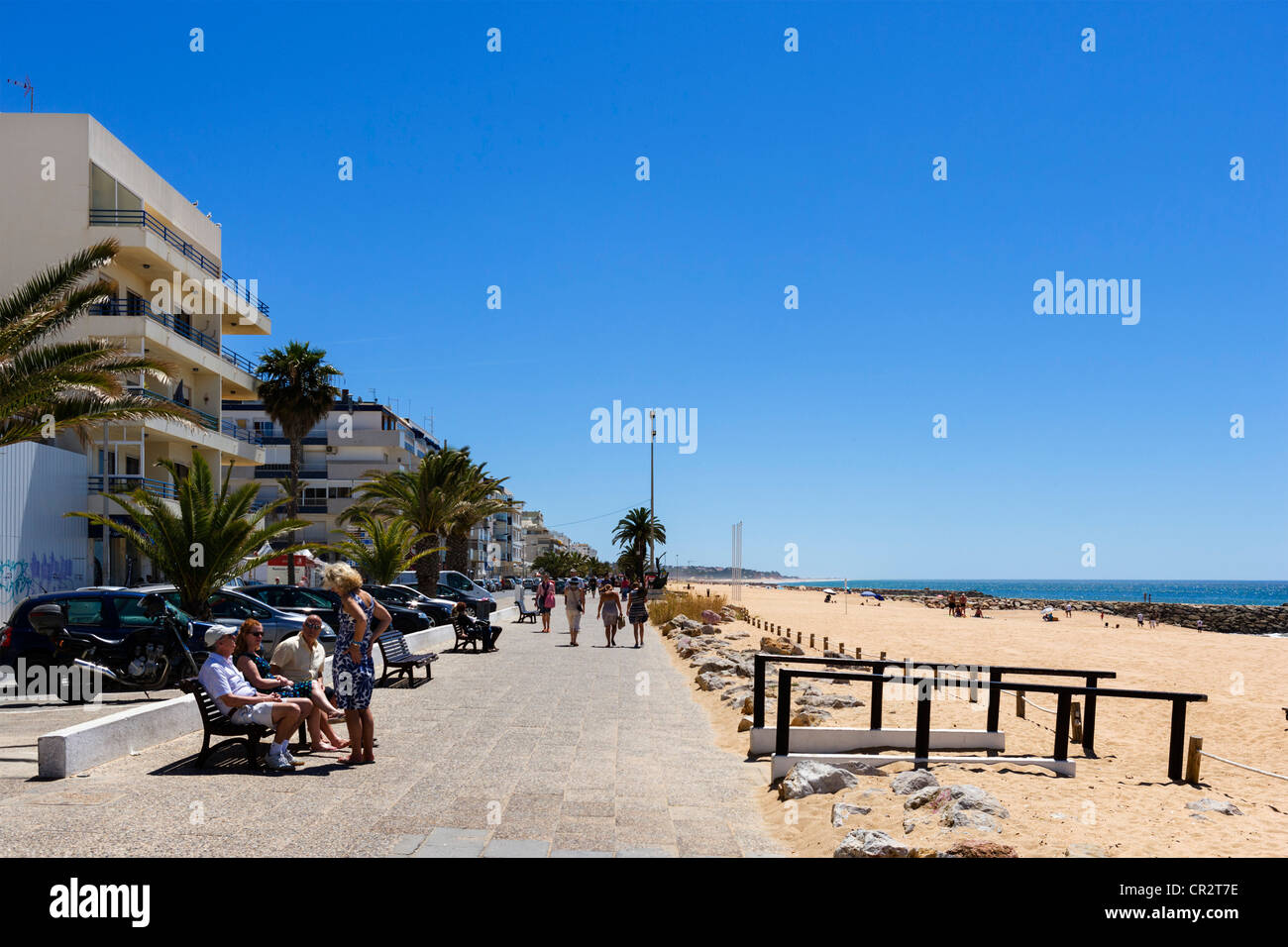 Beach and seafront promenade in Quarteira, Algarve, Portugal Stock ...