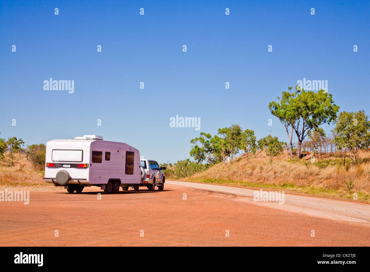 A typical Outback touring rig heads back onto the road at a Western ...