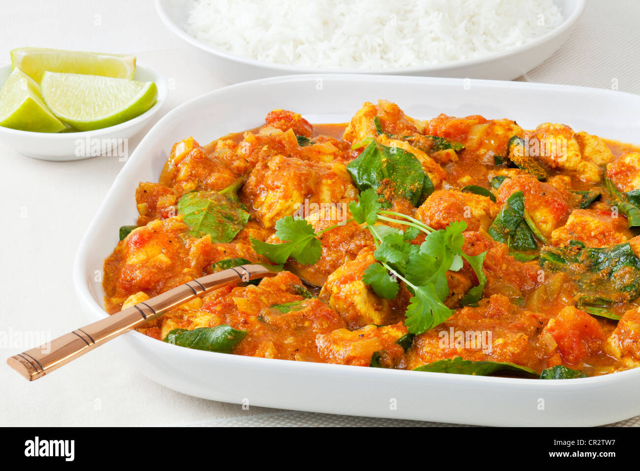 Chicken sag or saag, a spicy chicken dish with baby spinach, served ...