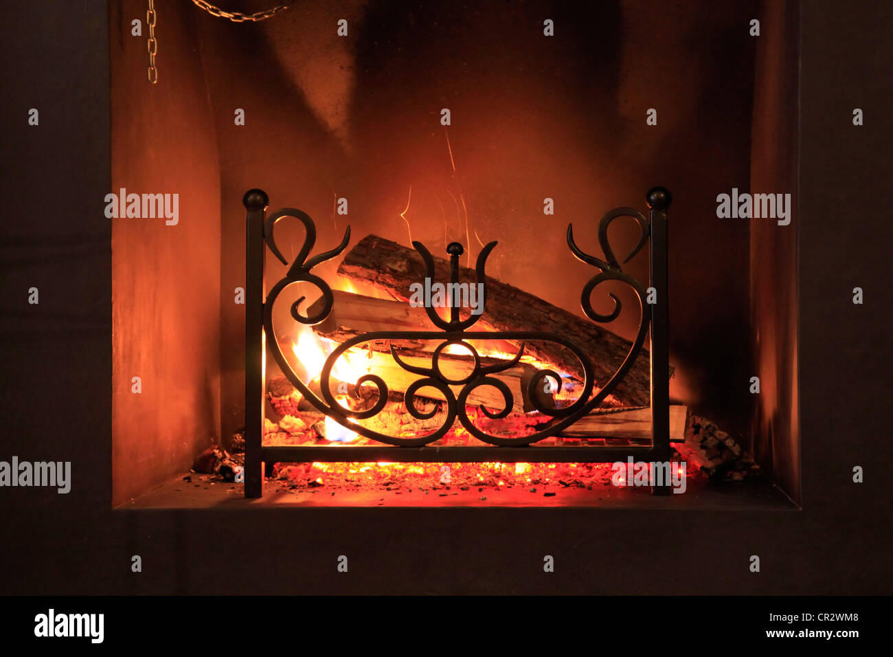Fire with sparks in a beautiful fireplace Stock Photo - Alamy