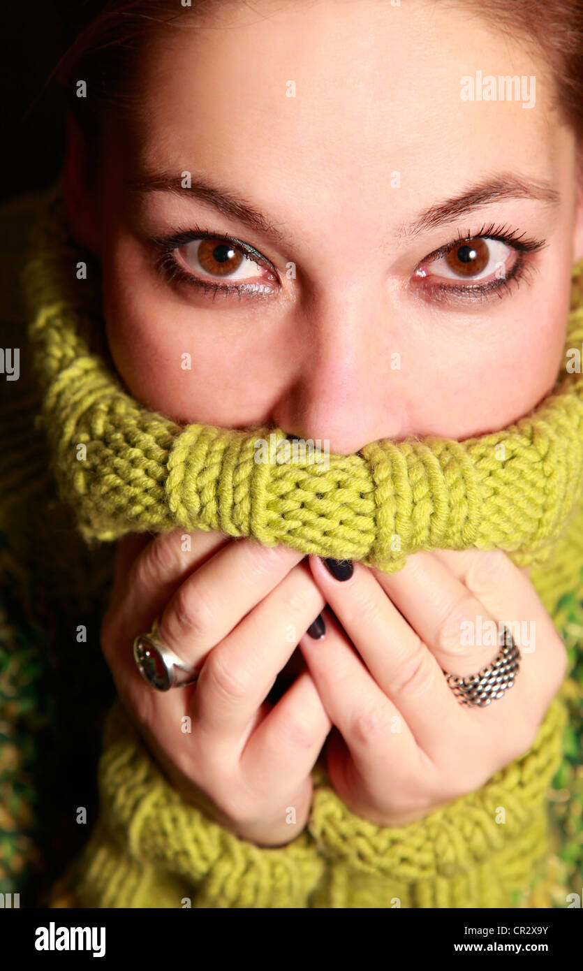 Portrait of the adult woman in a warm sweater Stock Photo - Alamy