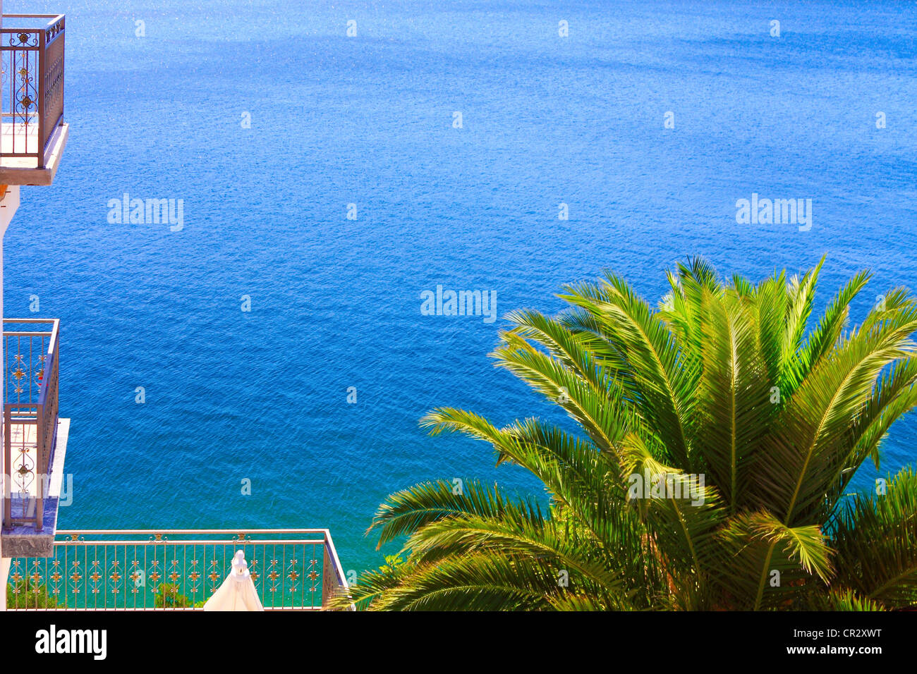 Overlooking the blue sea Stock Photo - Alamy