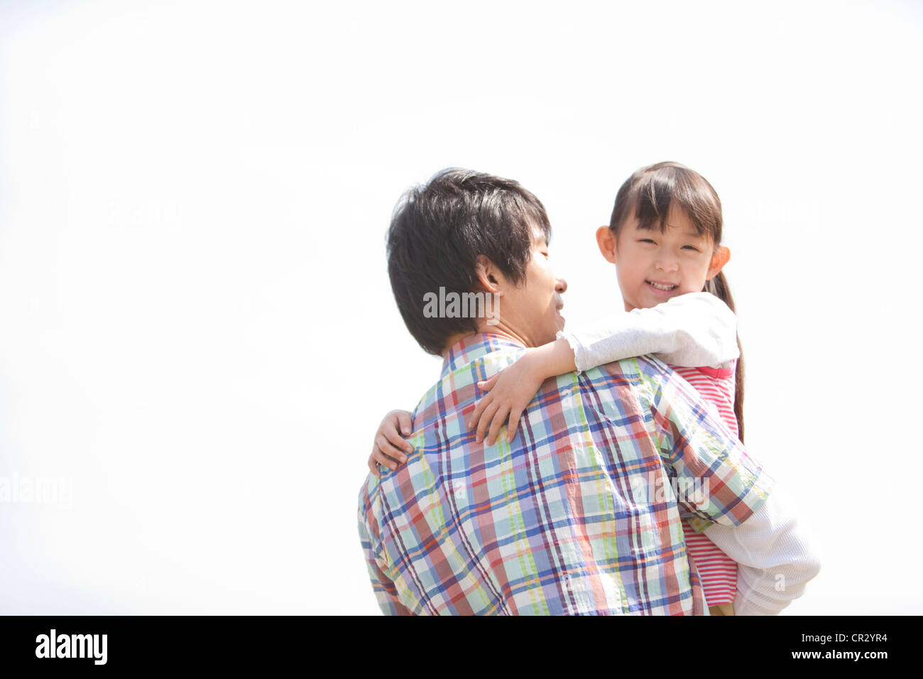 Father Carrying Daughter Stock Photo - Alamy