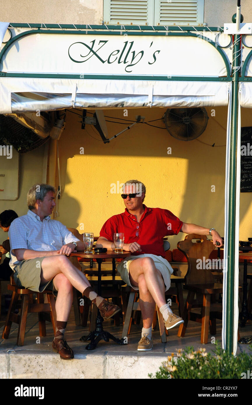 Enjoying an evening drink at Kelly's Irish Pub in the old harbour at St ...