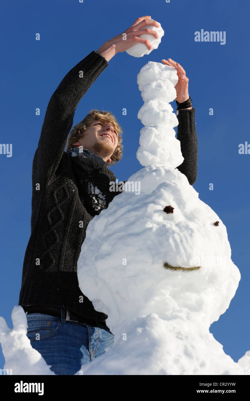 Building snowman man hi-res stock photography and images - Alamy