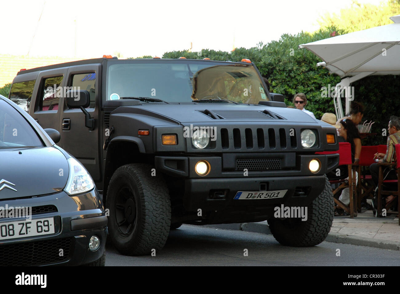 Blacked out Hummer driving through St Tropez, South of France Stock ...