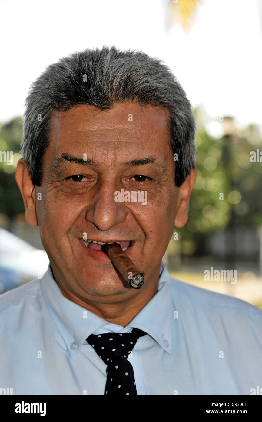 Cuban bus driver smoking a cigar, portrait, Havana, Cuba, Greater ...
