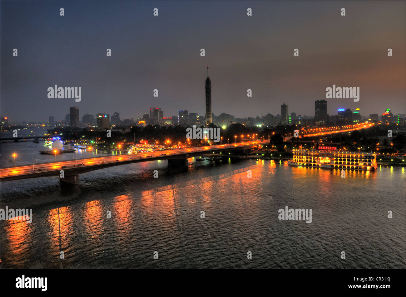 A central Cairo panorama looking west across the Nile River at dusk ...