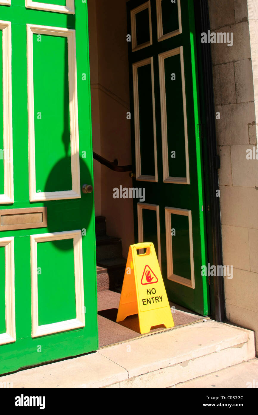 A small portable No Entry sign in the doorway of a building Stock Photo ...