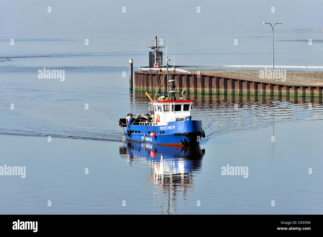 Trischen, a ship of the coast guard moving into the lock system, Eider ...