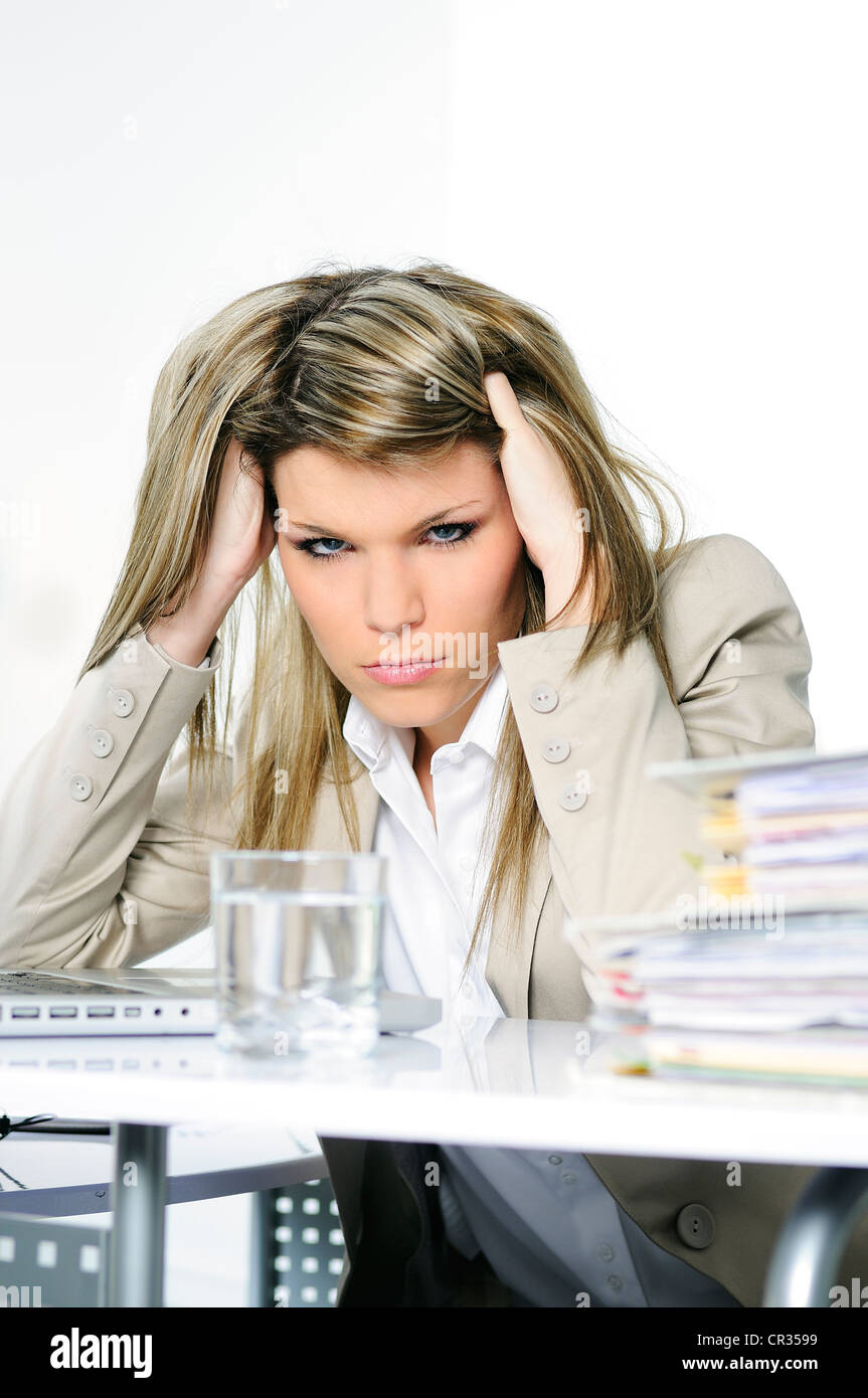stressed woman working on computer Stock Photo - Alamy