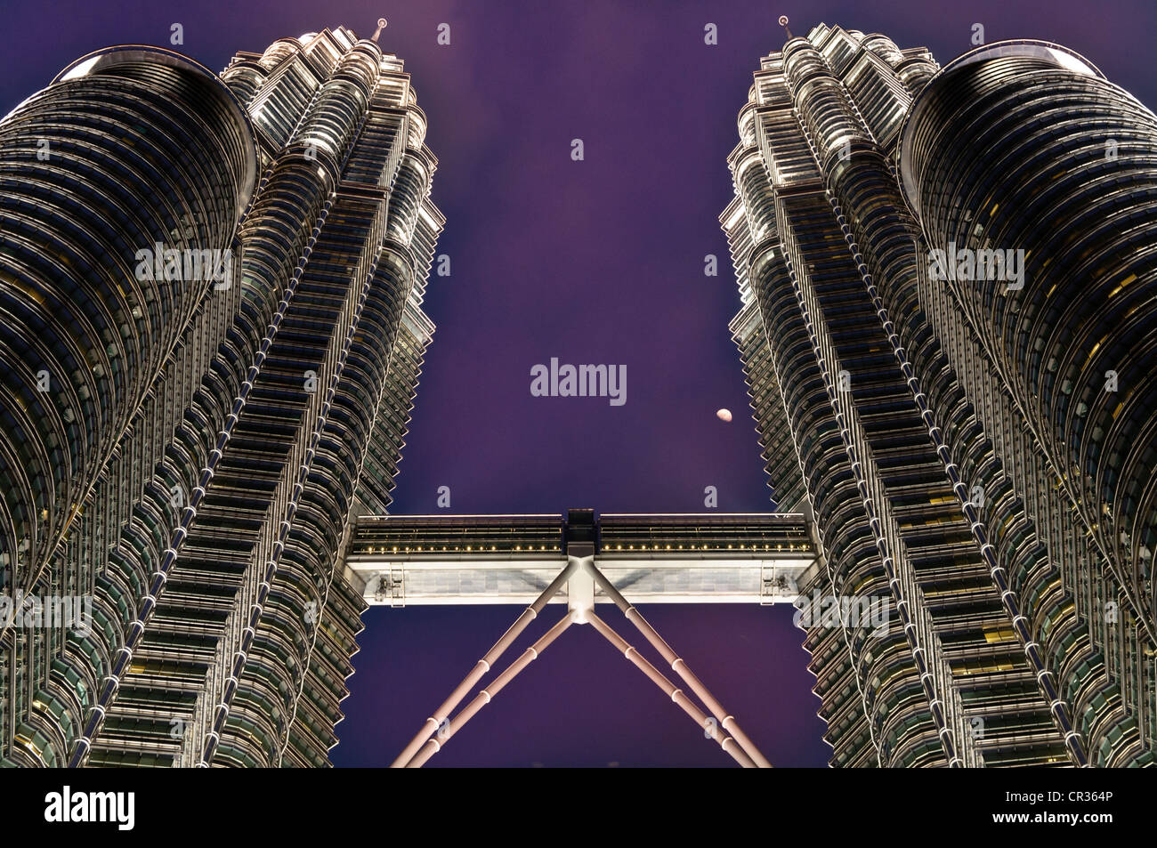 Petronas Towers at night with moon, skybridge, Kuala Lumpur, Malaysia ...