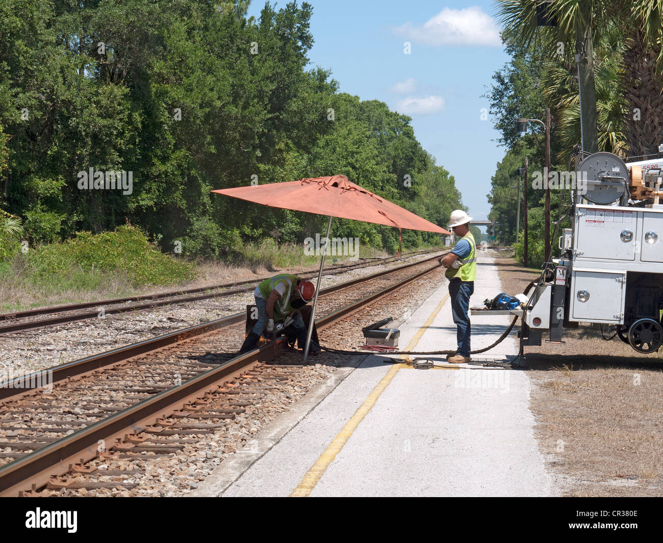 Men working on railroad track hi-res stock photography and images - Alamy