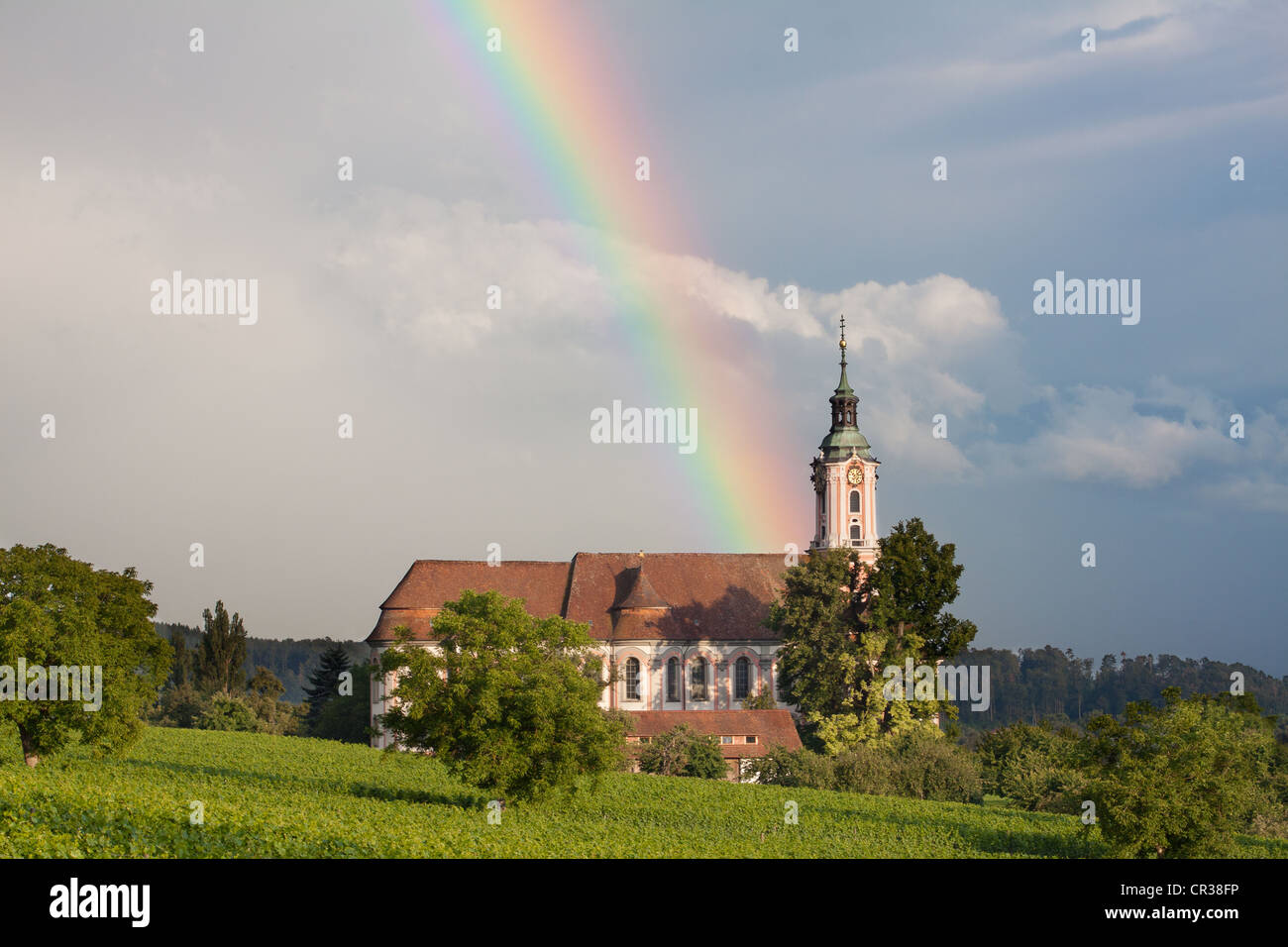 Rainbow over church hi-res stock photography and images - Alamy