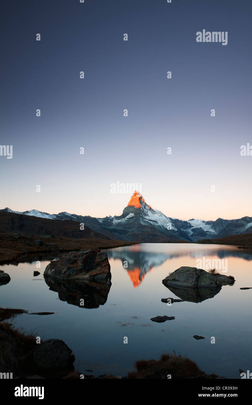 Mt Matterhorn at sunrise, reflection in Stellisee Lake, Zermatt, Canton ...