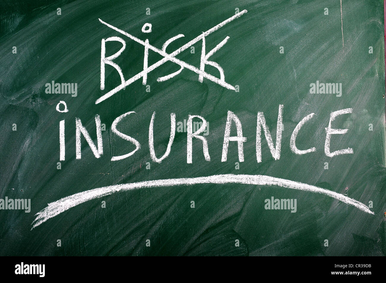 insurance risk crossed out green blackboard Stock Photo - Alamy